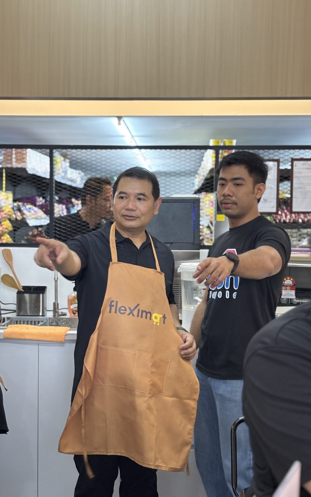 Former Economy Minister Serves RM1 Ice Cream In Latest Role